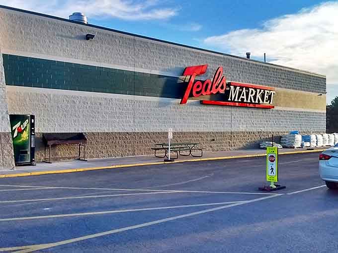 Teal's Market stands as the community's pantry, where shopping carts navigate aisles stocked with both everyday essentials and local specialties.