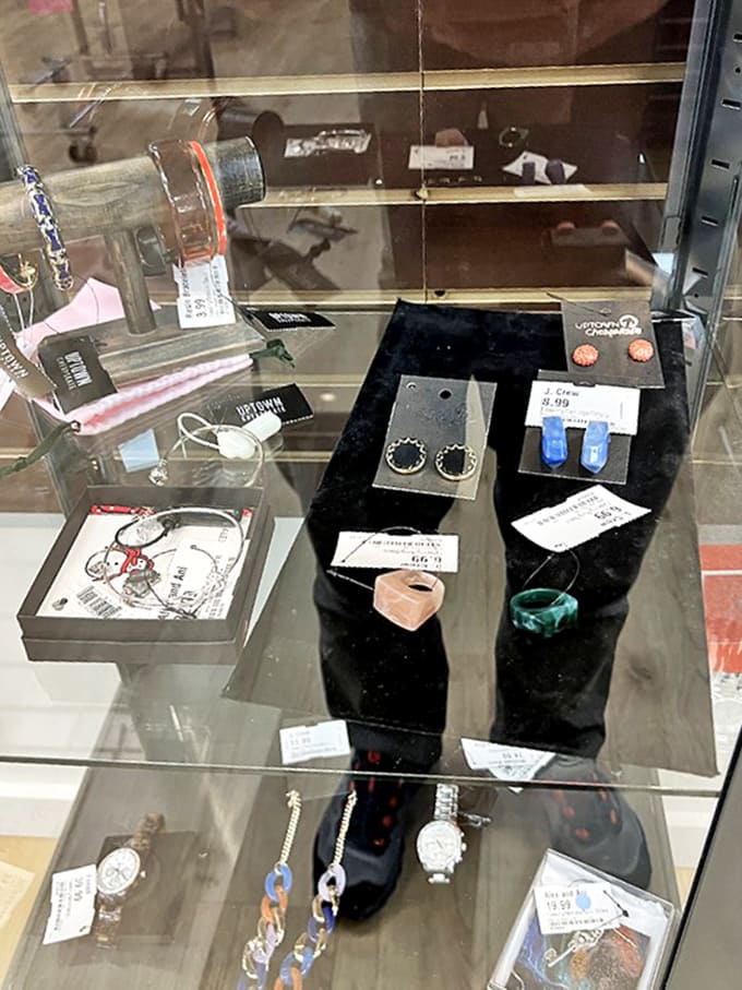 Jewelry that sparkles with possibility. The glass case presentation elevates these accessories from simple finds to potential treasures.