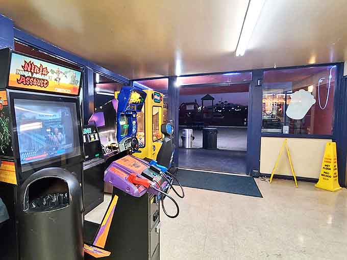 The arcade offers intermission entertainment between features. These vintage games have seen more movie plots than most film critics.