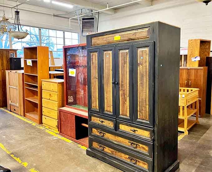 Cabinet collection that would make any storage enthusiast weak at the knees &ndash; that black and wood armoire is practically architectural.