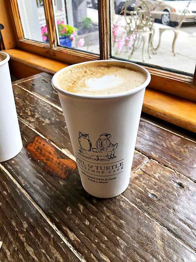 That latte isn't just coffee&mdash;it's fuel for chapter after chapter, with the shop's mascots keeping watch on the cup.