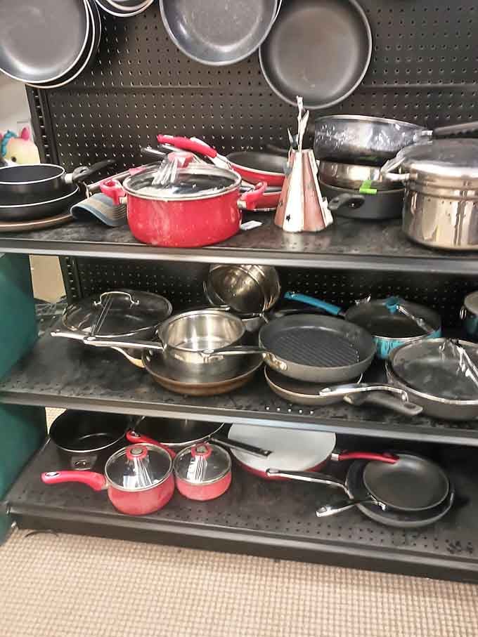 Pots and pans in every size await their kitchen comeback tour. Those red-handled saucepans could be the start of your next culinary masterpiece.