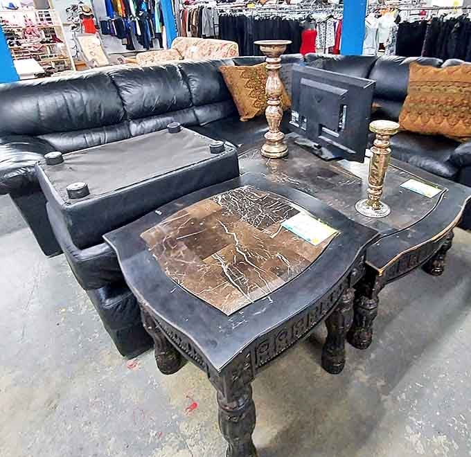 Living room potential on display&mdash;that coffee table has probably hosted everything from homework to holiday feasts in its previous life.