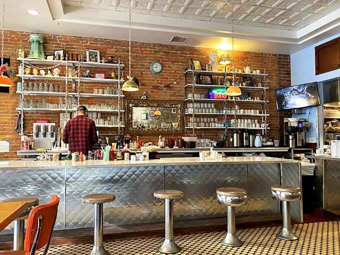 The counter seating offers front-row tickets to the culinary show, where coffee flows and breakfast dreams come true.