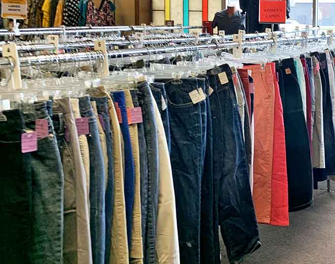 Denim democracy in action! Jeans of every color and size hang neatly, waiting for their perfect match to walk by.