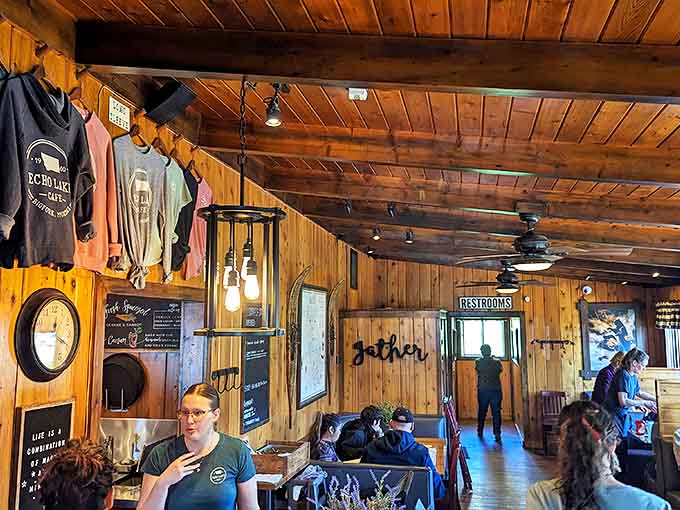 The word "Gather" isn't just decor &ndash; it's the mission statement of this timber-lined sanctuary where coffee flows and conversation follows.