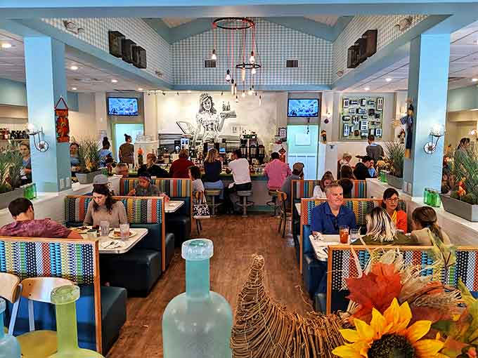 A full house of happy diners—the universal language of good food bringing strangers together in the shared religion of breakfast done right.