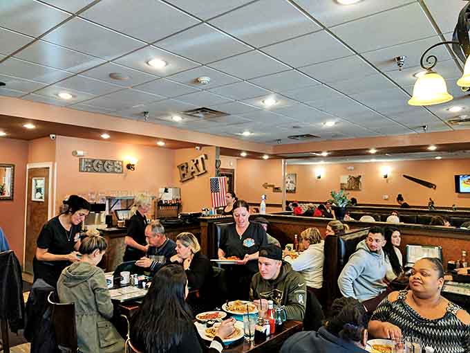 A busy morning at Iron Town – where regulars and first-timers share the universal language of "pass the syrup, please."