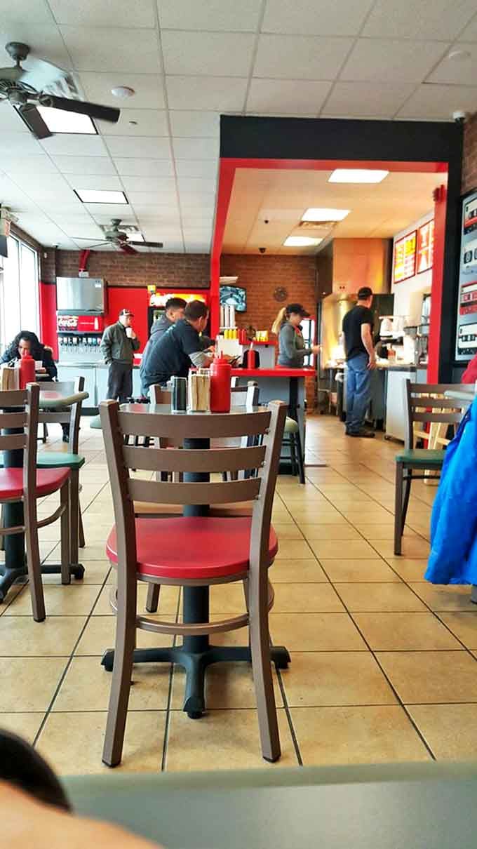Lunchtime symphony in progress. The harmonious blend of hungry patrons, sizzling grills, and the promise of perfect burgers creates music for the stomach.