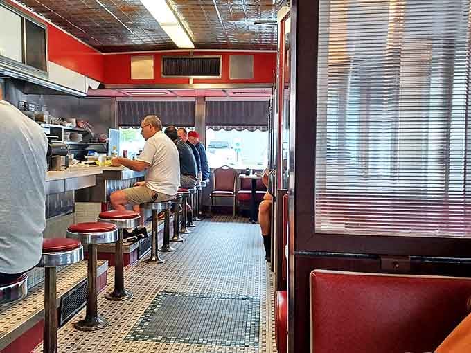 The counter seat – where solo diners become regulars and regulars become family. The best spot to watch short-order ballet in action.