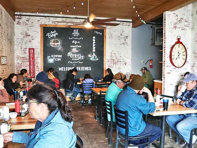 Where locals gather to solve the world's problems over breakfast. Notice how nobody's looking at their phones—the food demands full attention.