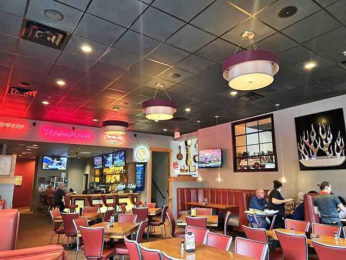 Red booths line the walls where locals gather to share news, celebrate occasions, or simply appreciate the universal language of good food.