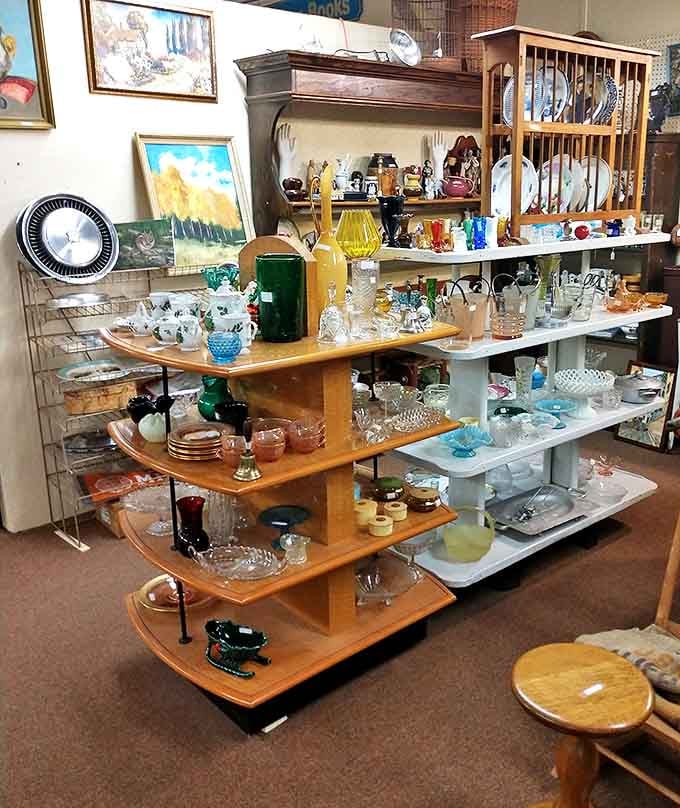Crystal catches the light while Depression glass whispers of simpler times. Grandma's china cabinet never looked this impressive.