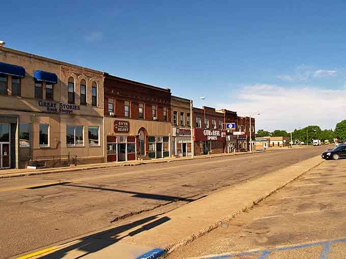 These historic buildings have weathered decades with grace, standing shoulder to shoulder like old friends who've seen it all together.