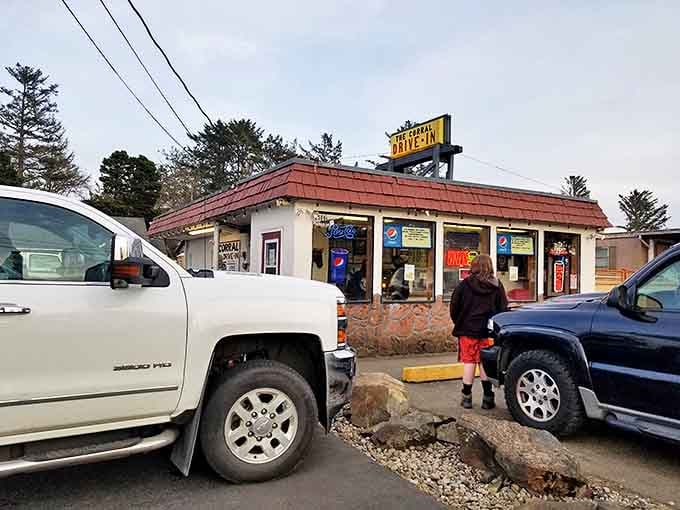 Evening approaches and the neon glow beckons hungry travelers like a lighthouse for the famished. Even the pickup trucks seem to know they've arrived somewhere special.