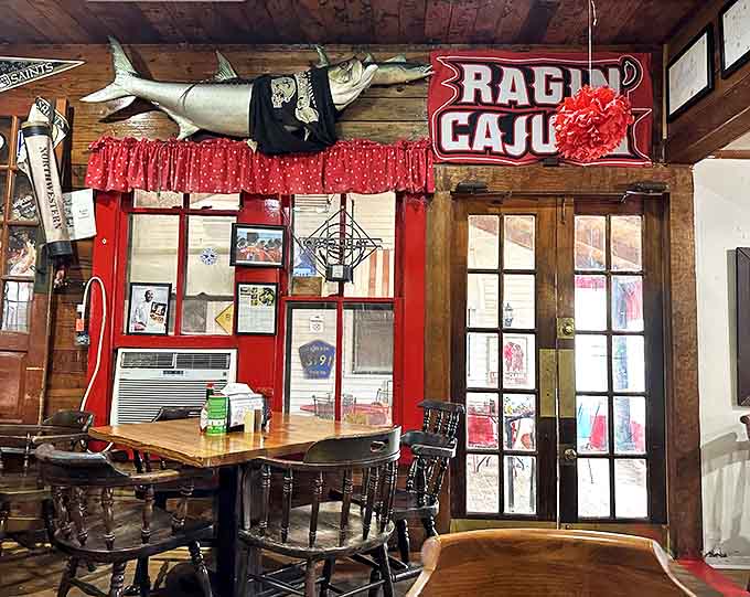 Ragin' Cajun pride adorns every surface&mdash;from the mounted fish to the UL Lafayette memorabilia. This isn't just decoration; it's community identity.