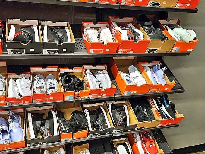 Sneaker paradise arranged with military precision. Each box contains not just shoes, but the promise of being slightly taller and infinitely cooler.