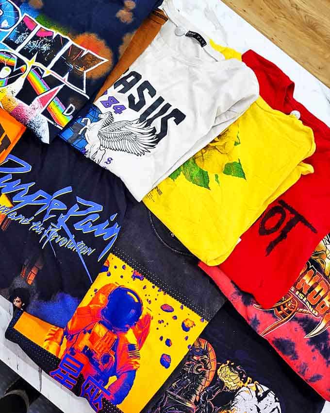 Graphic tees that speak volumes without saying a word. From ASICS to vintage-inspired designs, each one's a conversation starter waiting to happen.