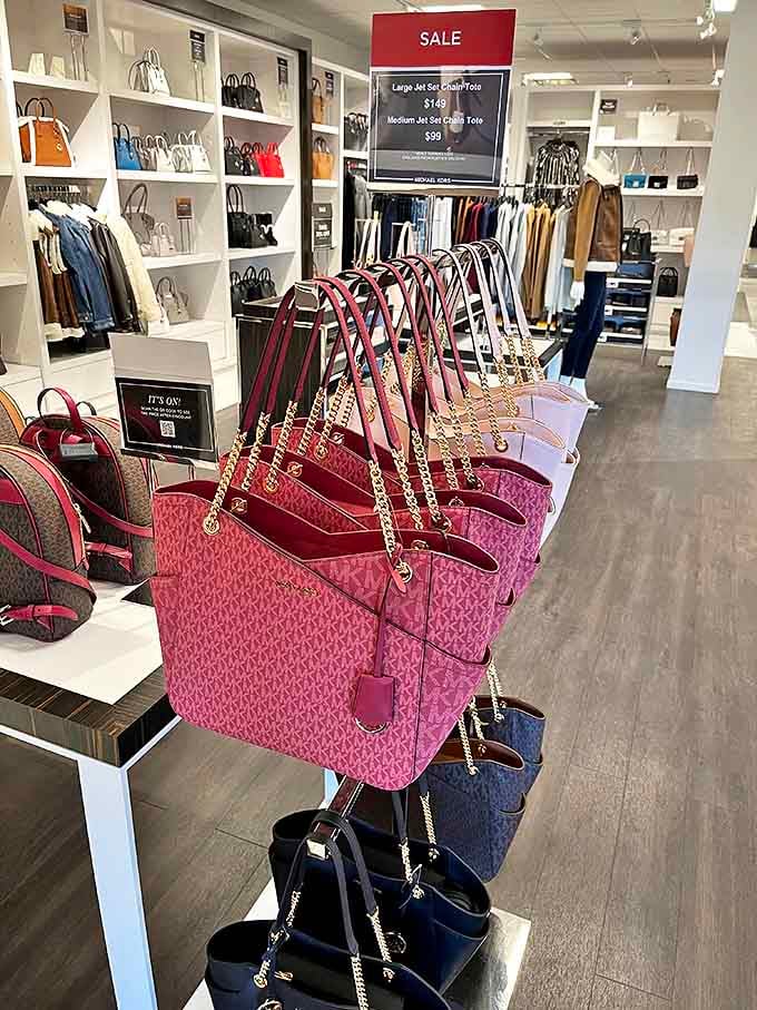 Michael Kors handbags lined up like soldiers ready for battle&mdash;the battle of making your outfit look more expensive than it is.