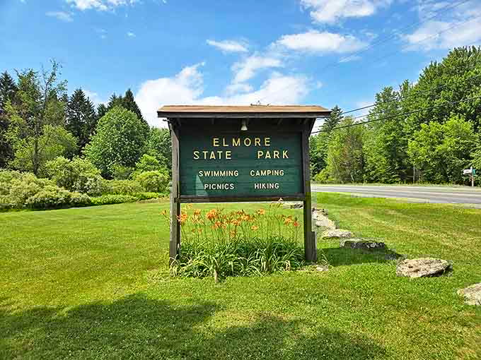 The unassuming entrance sign promises four simple pleasures that deliver more satisfaction than any theme park's flashy attractions.