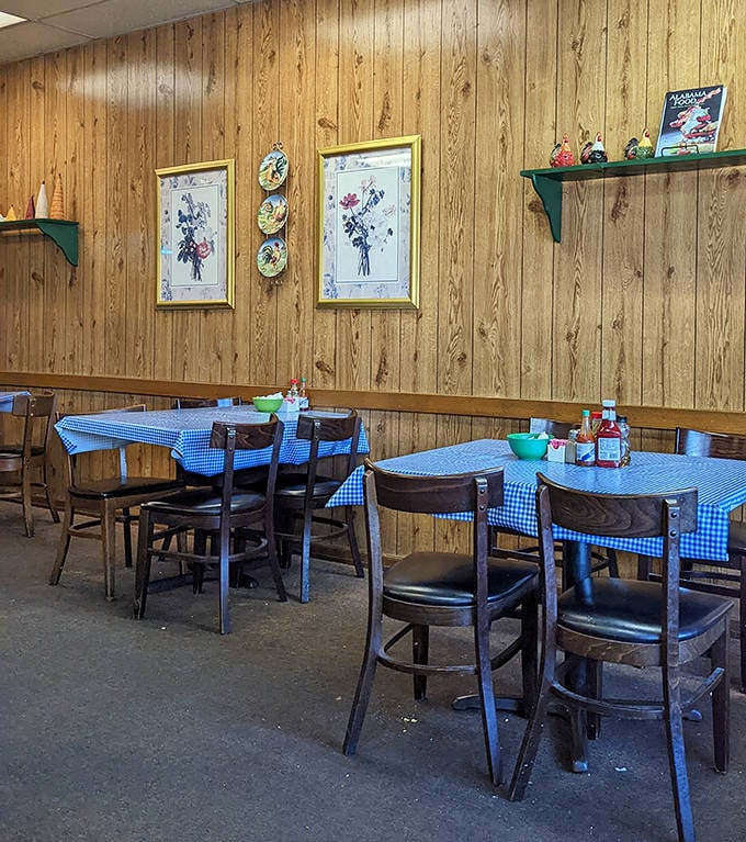 Framed floral prints and chicken figurines watch over diners like guardian angels of comfort food in this wood-paneled sanctuary.