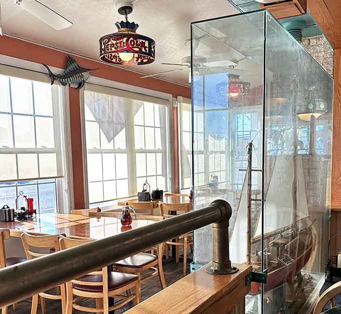 Sunlight streams through windows onto wooden tables where countless vacation memories have been made over plates of pancakes and eggs.