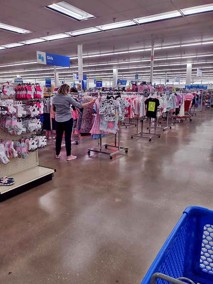 Treasure hunters in their natural habitat, carefully combing through racks of possibilities in the girls' section.