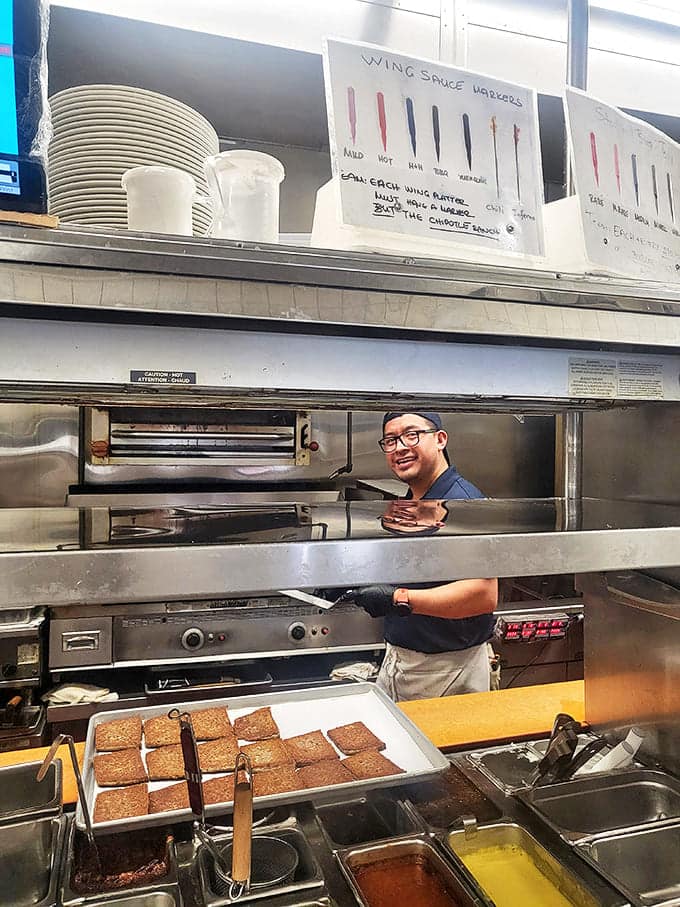 A glimpse into the kitchen reveals the magic-makers at work, transforming simple ingredients into memorable meals.