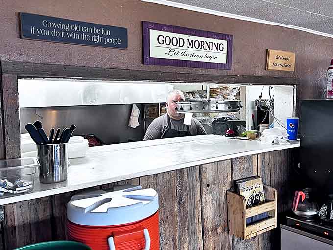 Behind every great breakfast is someone who wakes up earlier than you do. The pass-through window frames the morning's real hero.