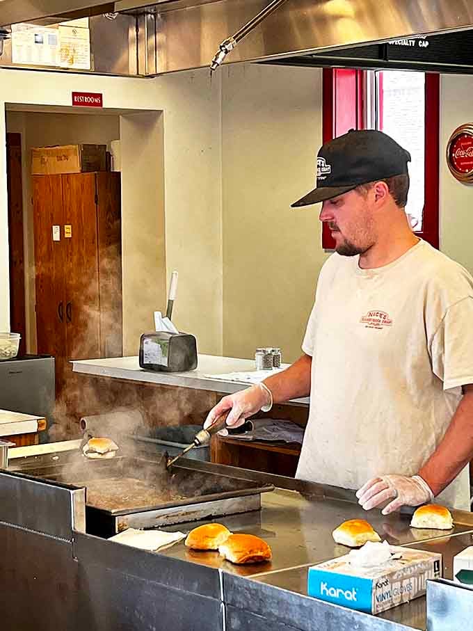 The ballet of burger-making happens right before your eyes&mdash;no secrets, no pretense, just practiced perfection on the flat-top.
