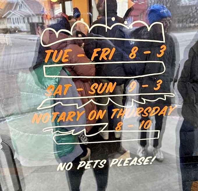 Hours posted with whimsical confidence. "Notary on Thursday" is the kind of delightful detail that makes neighborhood spots truly special.