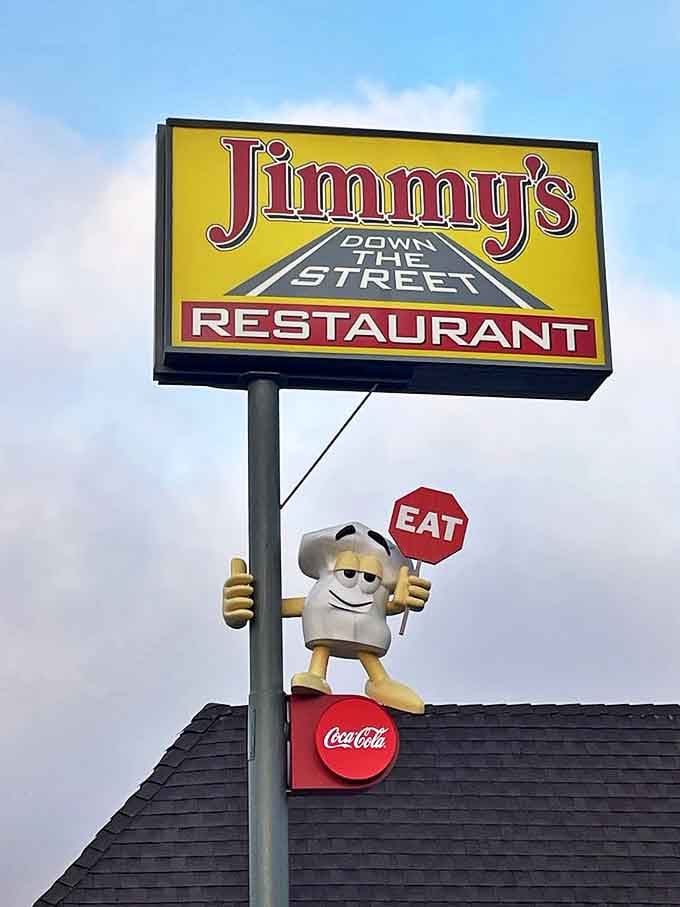 That cheerful chef mascot holding the "EAT" sign isn't just cute—he's giving you the best advice you'll get all day.