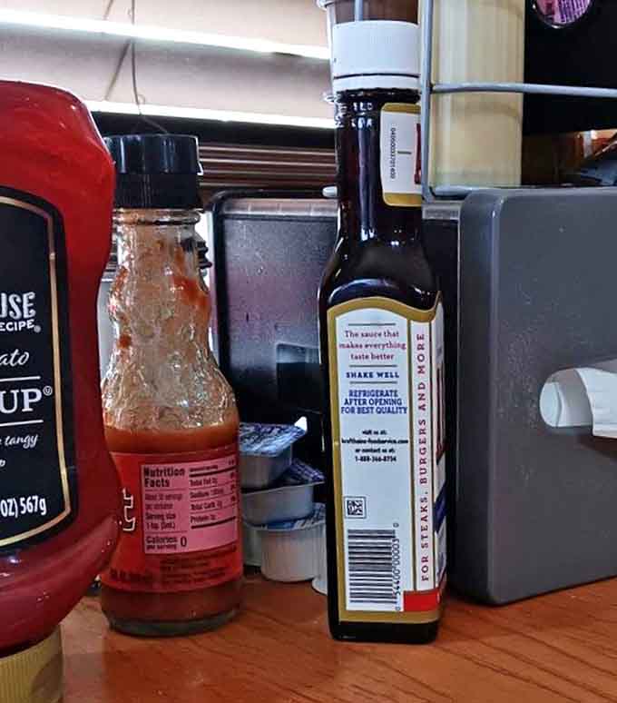 Table condiments arranged with military precision&mdash;the unsung supporting cast ready to elevate your meal from great to transcendent.