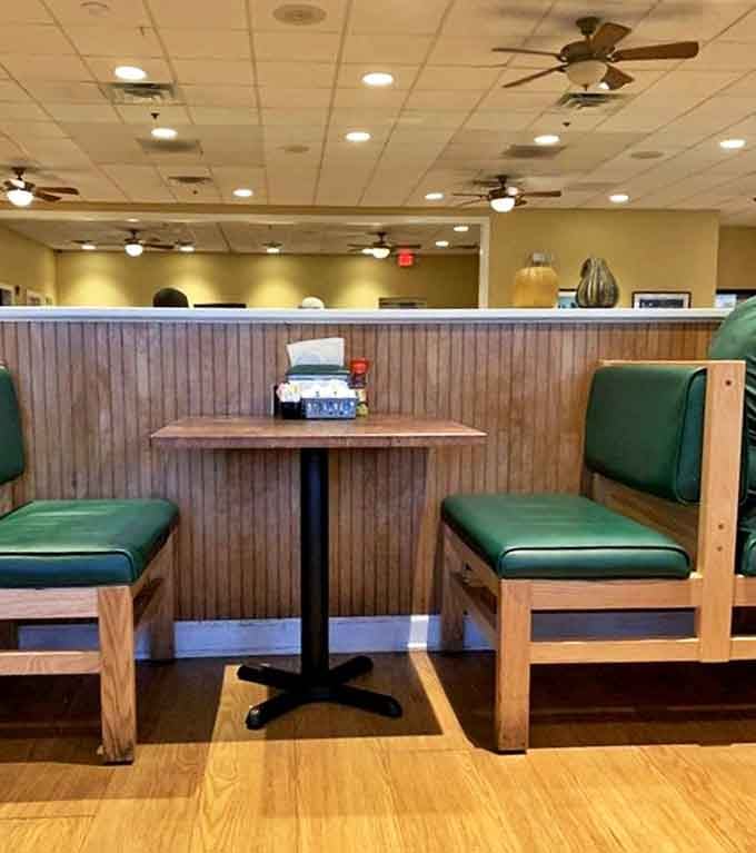 Simple wooden tables and green booths create the perfect stage for the real star of the show &ndash; what's about to arrive on your plate.