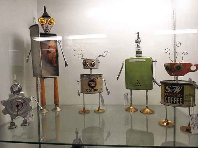 Whimsical robot sculptures crafted from vintage tins and household items &ndash; proof that yesterday's trash becomes today's treasure in creative hands.
