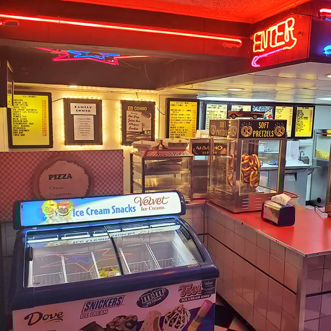 Inside the concession stand, time stands deliciously still. Every ice cream freezer and pretzel warmer tells a story of American movie nights.