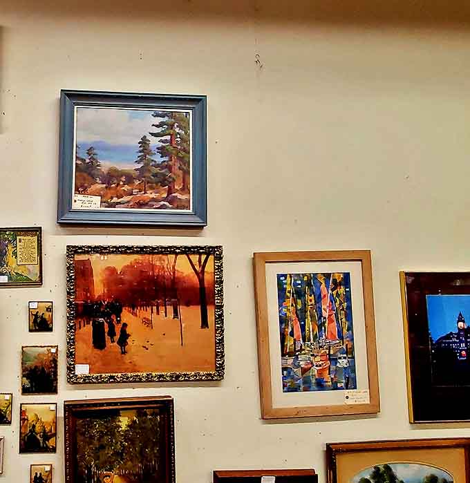 Wall-to-wall art creates a gallery effect that would make museum curators jealous. Each frame holds someone's vision of Montana's beauty.