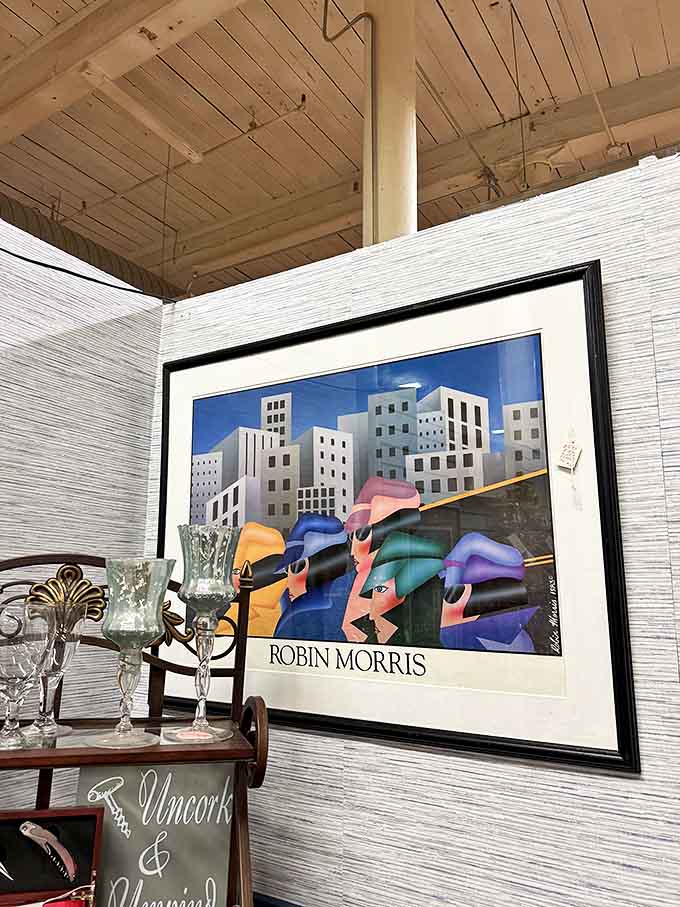 A Robin Morris print holds court among crystal stemware, proving that art appreciation and treasure hunting go hand in hand.