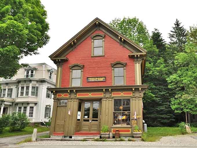 The vibrant red general store in Cherryfield stands as a cheerful sentinel of small-town life. A perfect example of the affordable character waiting in Maine's hidden corners.