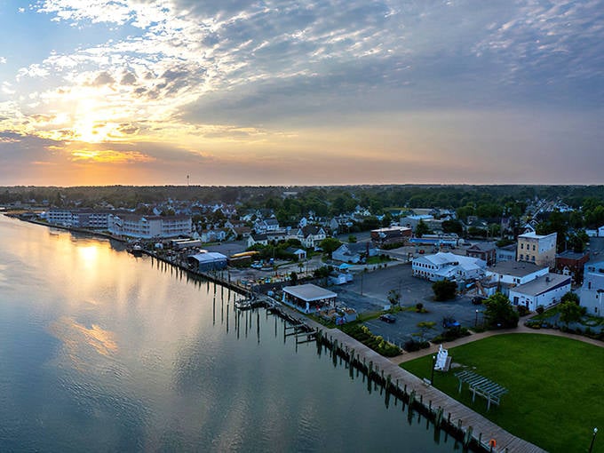 Waterfront sunset paints the sky in colors that make every mainland worry seem wonderfully far away.