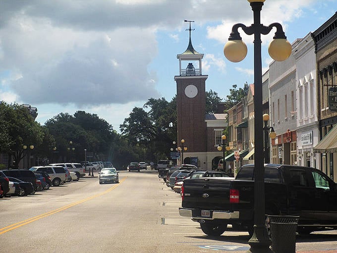 Georgetown's iconic clock tower stands tall over the historic downtown, marking time for lovers meeting beneath its watchful face.