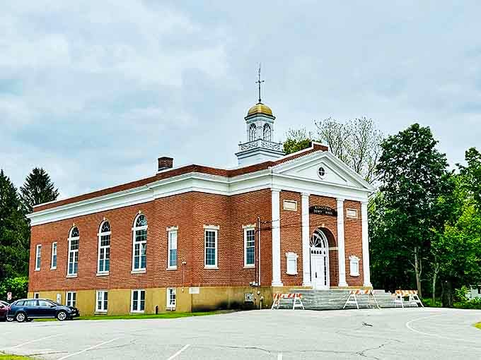 Small-town grandeur at its finest! Kingston's brick municipal building stands ready for another century of community gatherings.