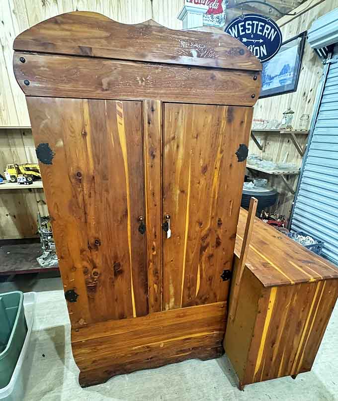 This handcrafted wooden cabinet has witnessed more history than most history books, its patina telling stories of homes long forgotten.