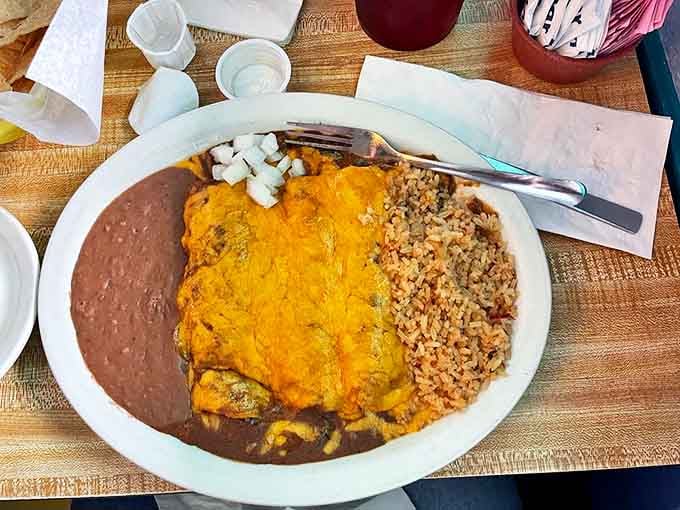 Enchiladas smothered in cheese and chili gravy&mdash;the kind of comfort food that makes you want to call your mother and thank her for everything she's ever done.