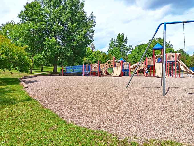 Bennett Park's playground equipment stands ready for adventure, proving that sometimes the best entertainment doesn't require batteries or Wi-Fi passwords.