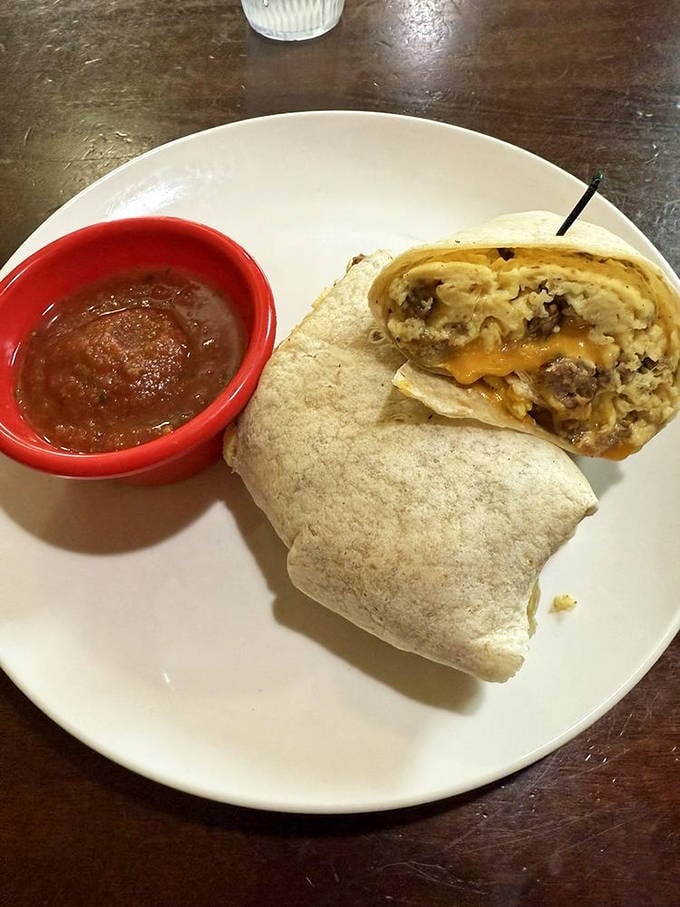 A breakfast burrito that's had its morning coffee &ndash; fully awake and ready to satisfy. Salsa on standby for the perfect kick.