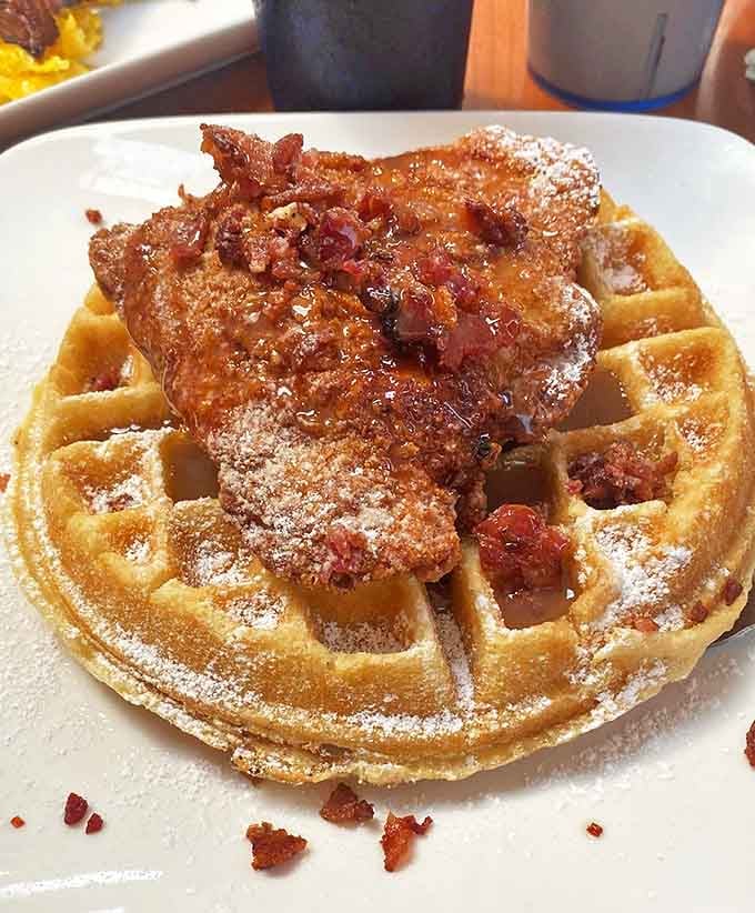 Chicken and waffles: the breakfast-lunch alliance that proves opposites really do attract. Sweet, savory, and sprinkled with bacon&mdash;the holy trinity.