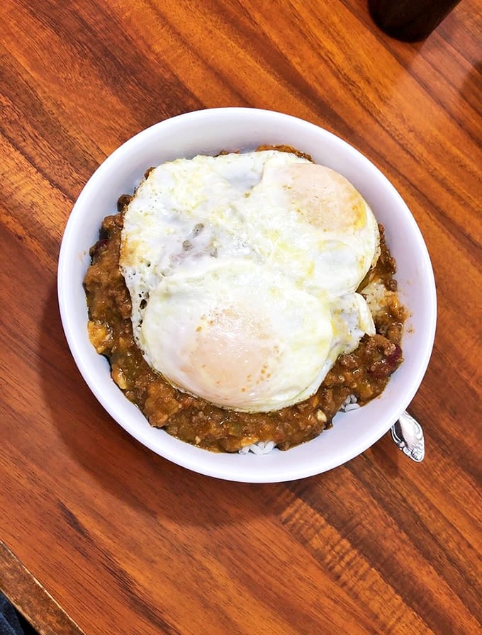Loco Moco &ndash; Hawaii's gift to hangover cures everywhere. Two eggs crowning a throne of rice and gravy-smothered goodness.