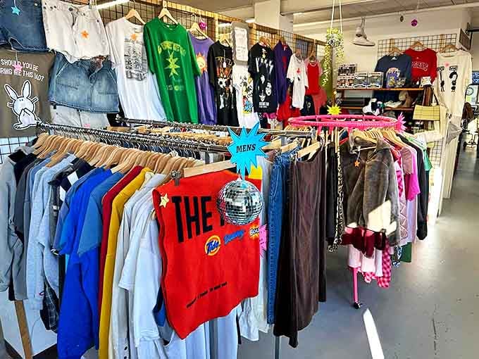 Fashion fossils hanging in suspended animation. That concert tee isn't just clothing—it's someone's best night ever, preserved in cotton.