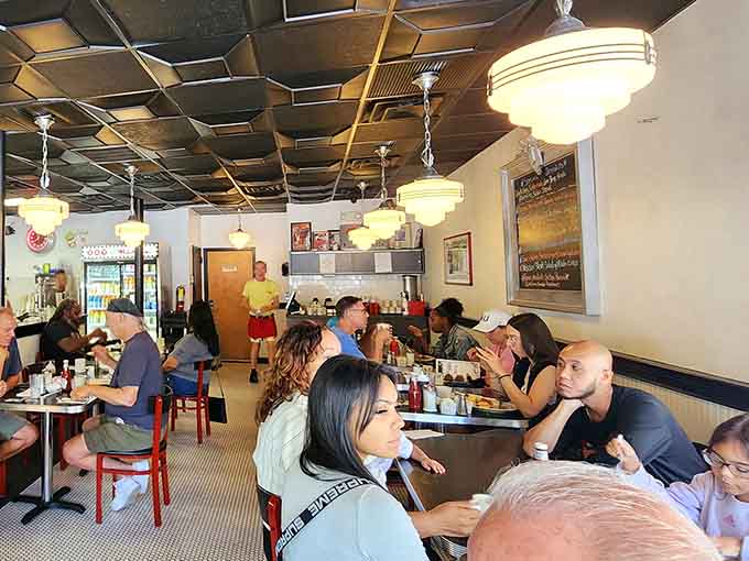 The bustling dining room at Mike's&mdash;where strangers become temporary neighbors united by the universal language of "pass the syrup, please."
